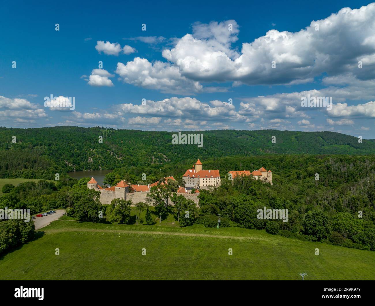 Aerial view of Veveri castle in Moravia with large courtyards, multiple ...