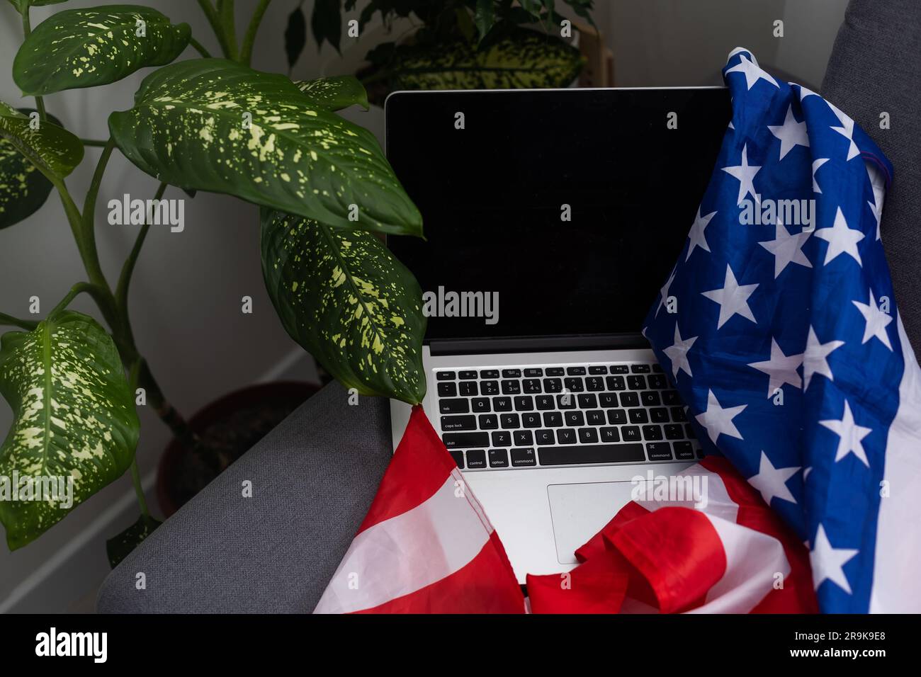 US flag and laptop on background with copy space Stock Photo - Alamy