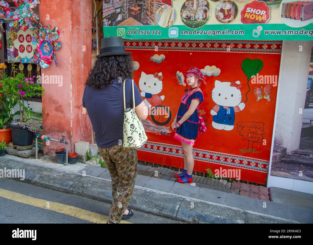 February 25 2023- George Town -Penang-Malaysia-Many tourists visit the Old Town for the murals ...