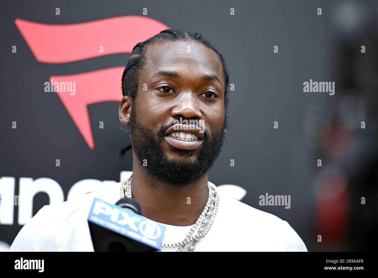 New York, USA. 27th June, 2023. Meek Mill seen being interviewed during ...