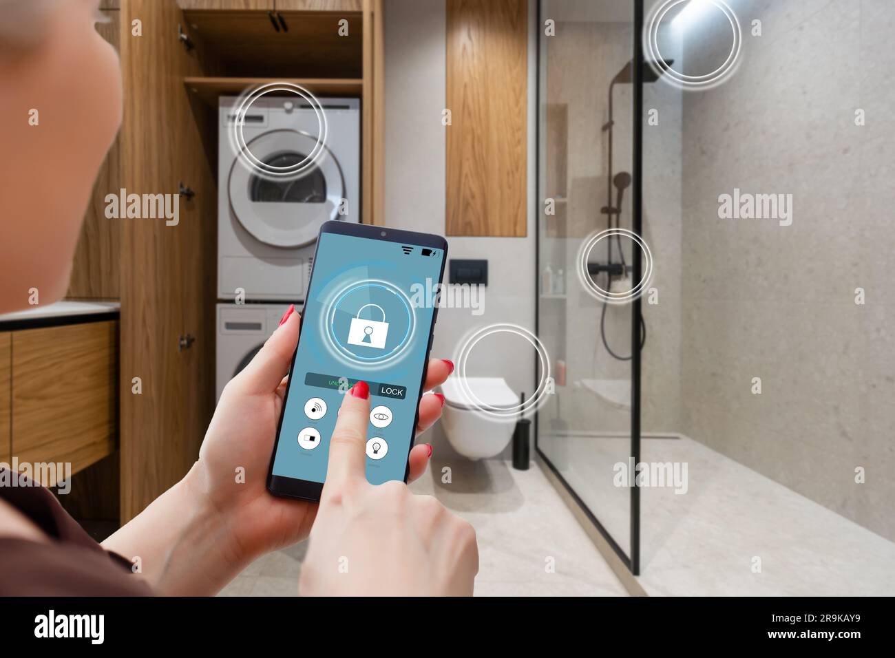 Smart home technology interface on smartphone app screen with augmented ...
