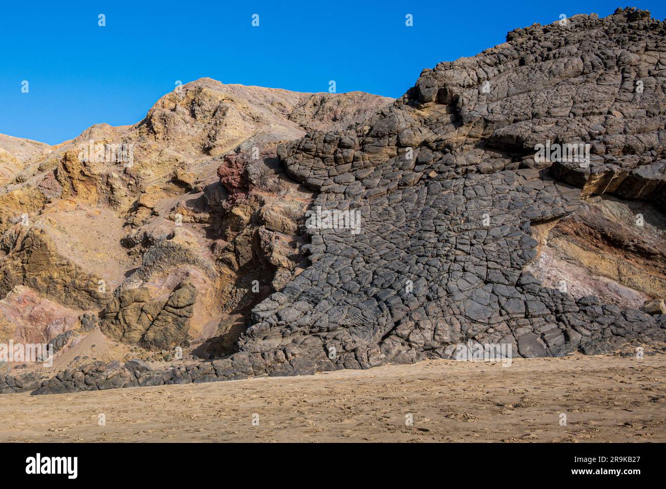 Ventifact rock formations caused by wind at La Pared Beach ...