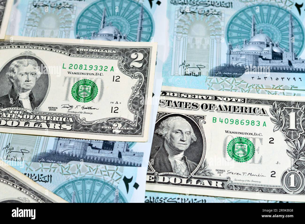 Background of USD American dollars money bills with the new Egyptian 20 ...