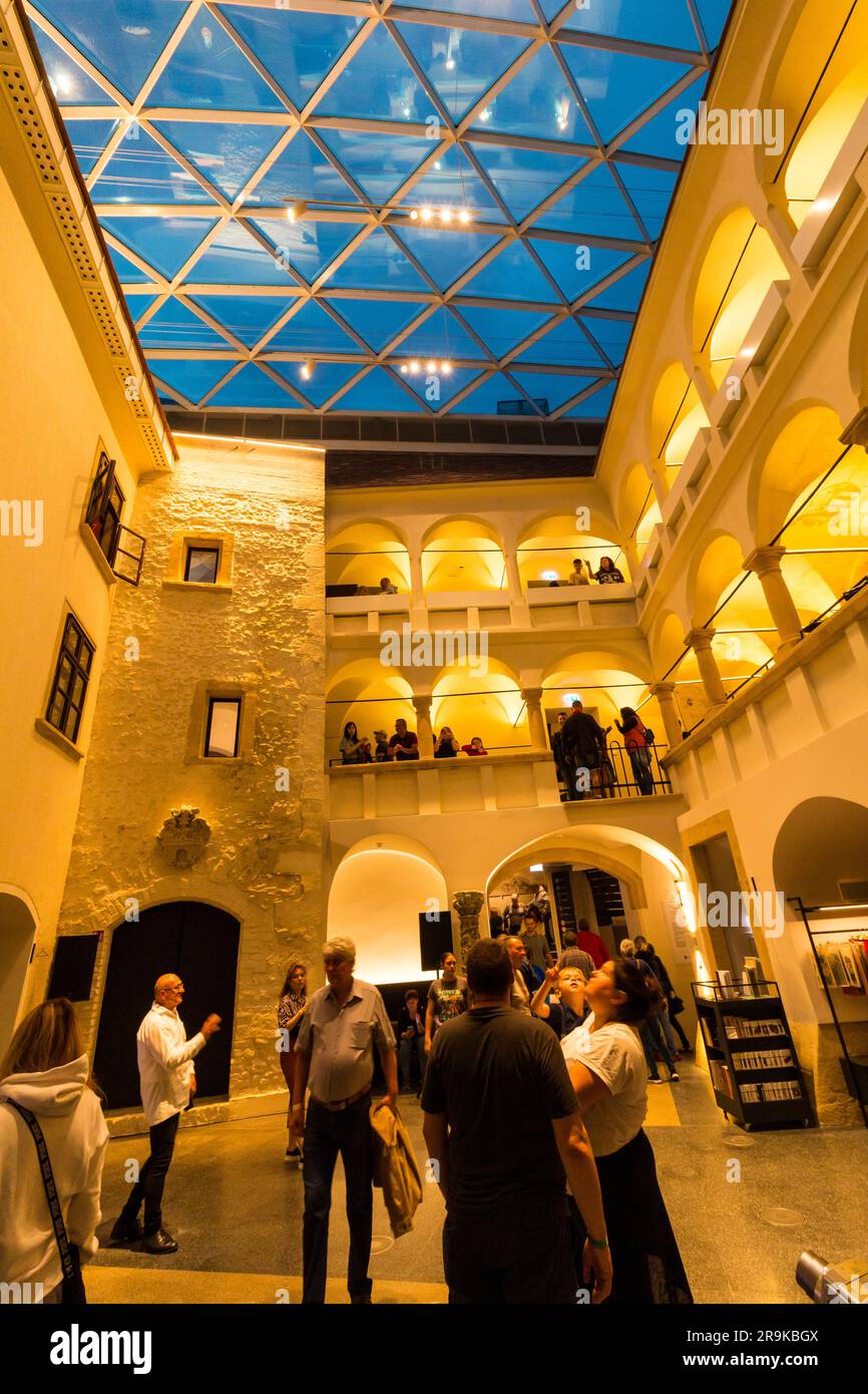 Illuminated inner court of 'Muzeumnegyed' (Museum Quarter) at night on ...