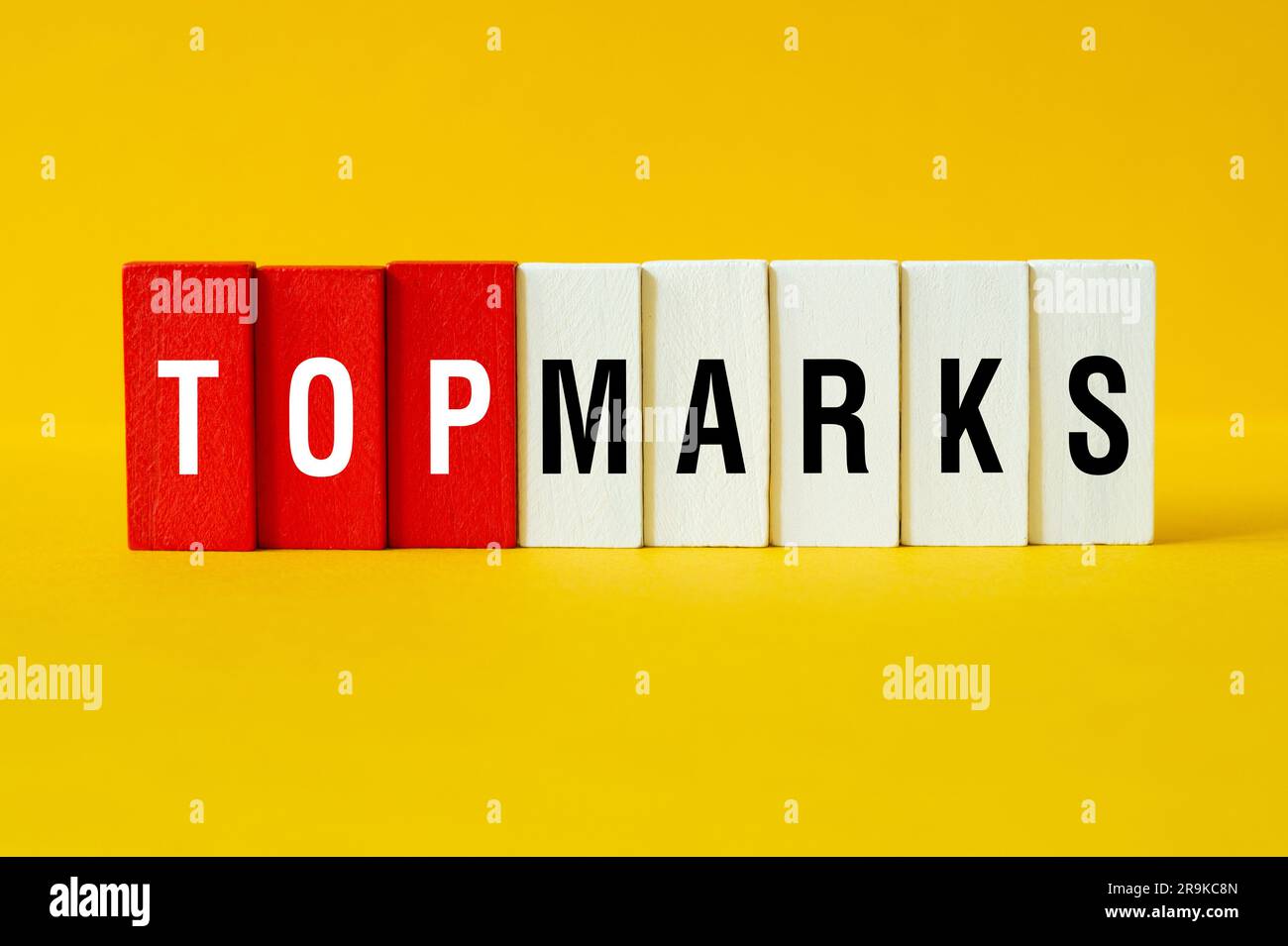 Top marks - word concept on building blocks, text, letters Stock Photo ...