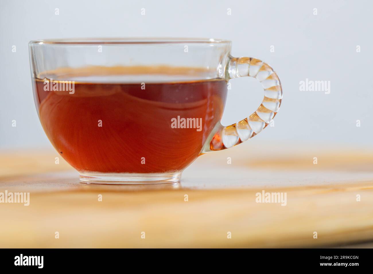Black tea glass cup detail selective focus perspective Stock Photo - Alamy