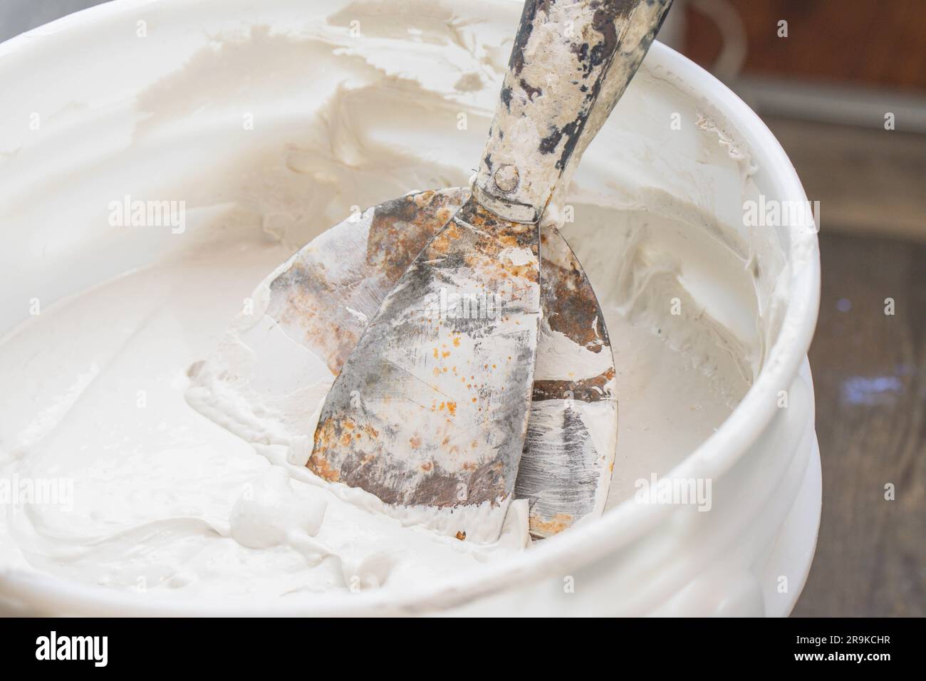 Working with sparkle wall compound spatula human hand construction ...