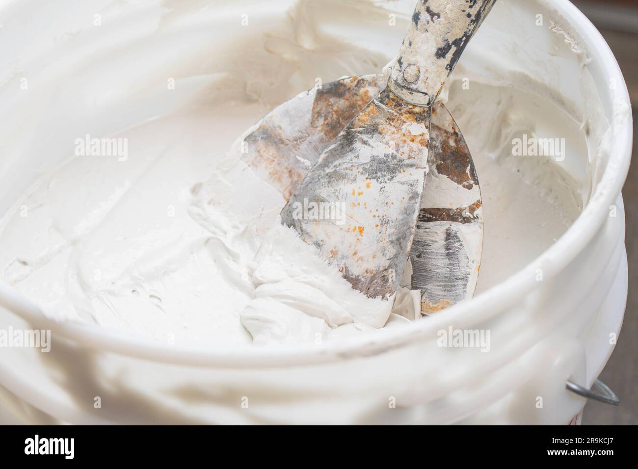 Working with sparkle wall compound spatula human hand construction ...