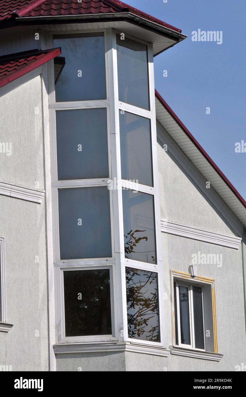 View and design of a metal-plastic window from the outside Stock Photo - Alamy