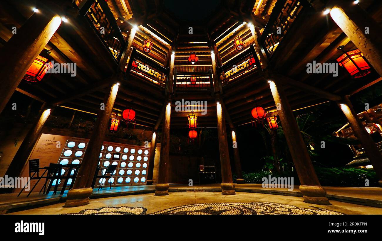 A stunning nighttime view of the traditional Hakka architecture of ...