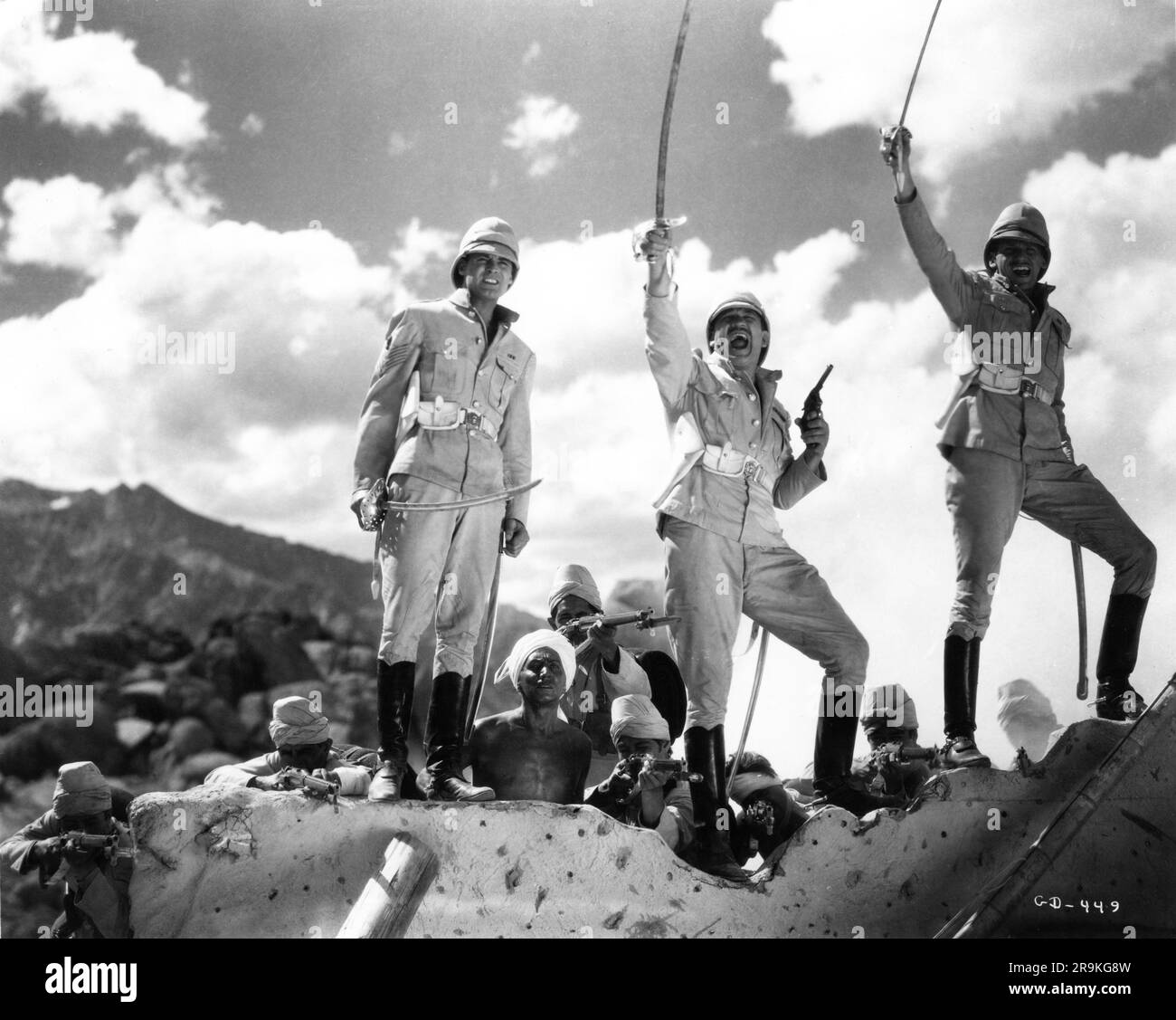 CARY GRANT SAM JAFFE VICTOR McLAGLEN and DOUGLAS FAIRBANKS Jr. in GUNGA ...