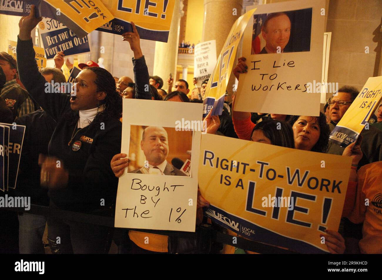 Union members shout slogans against the Right to Work legislation which ...