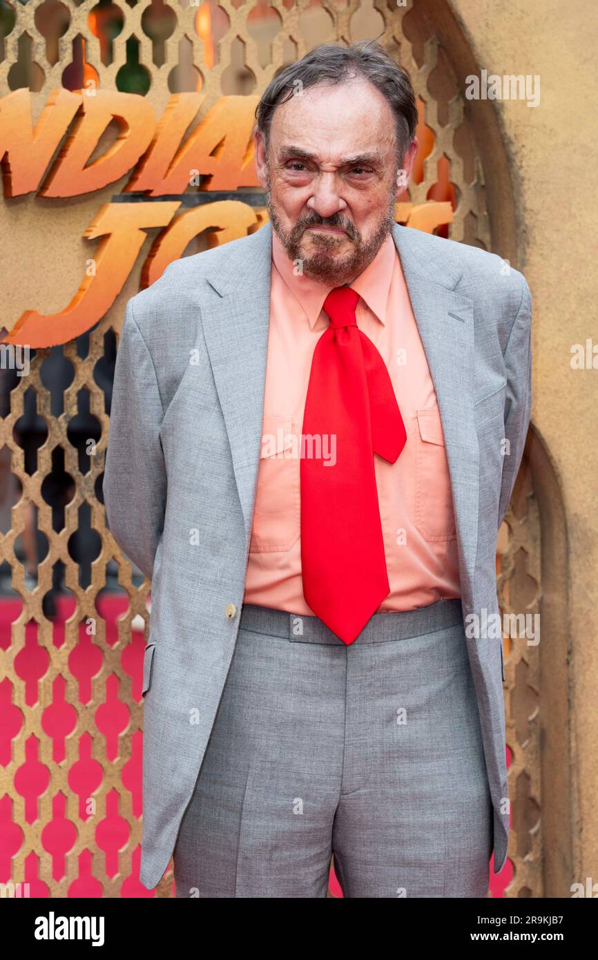 John Rhys-Davies poses for photographers upon arrival at the premiere ...