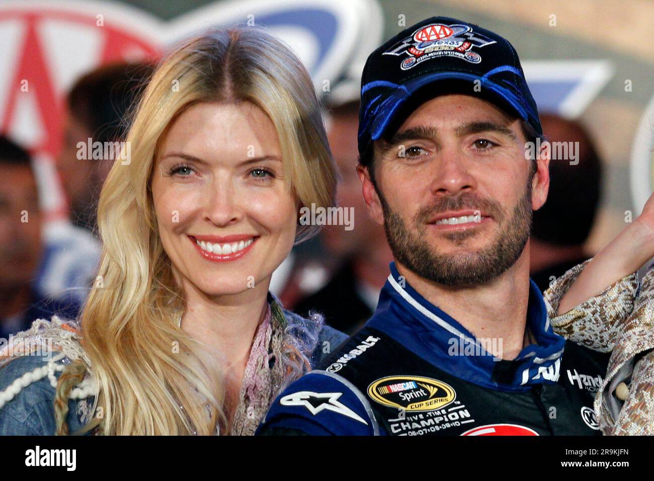 FILE - Jimmie Johnson poses with his wife Chandra Janway in victory ...