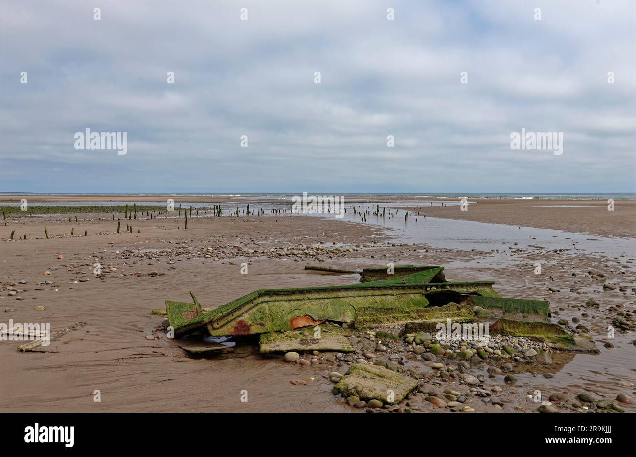 The corroded metal remains of a Ship Wreck on Montrose Beach exposed at ...