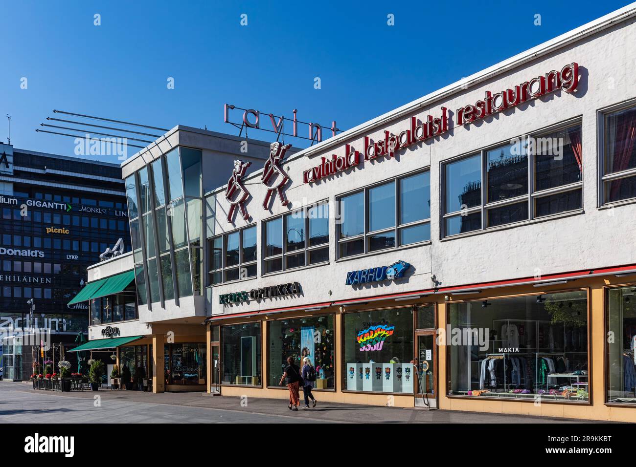 Street view of Helsinki. Lasipalatsi is a functionalist building ...