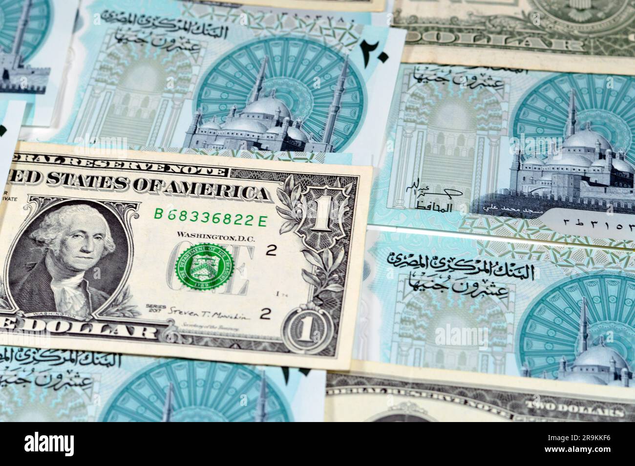 Background of USD American dollars money bills with the new Egyptian 20 ...