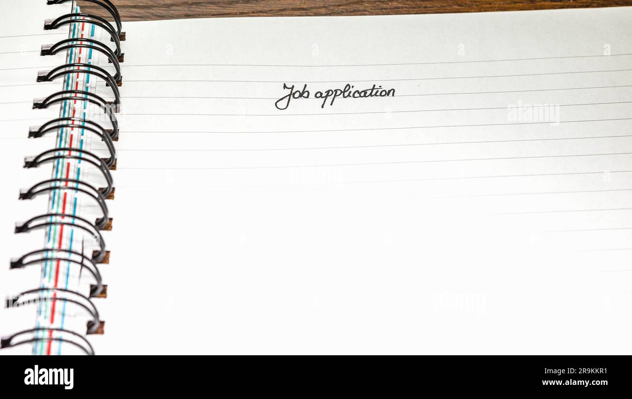 Job application, handwriting text on page of office agenda, office ...
