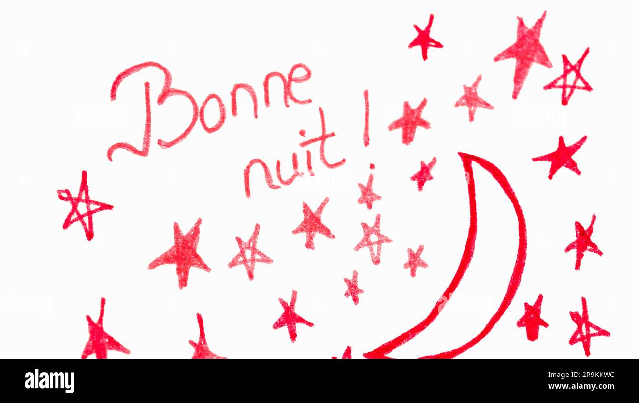Bonne nuit (good night) handwriting text close up isolated on yellow ...