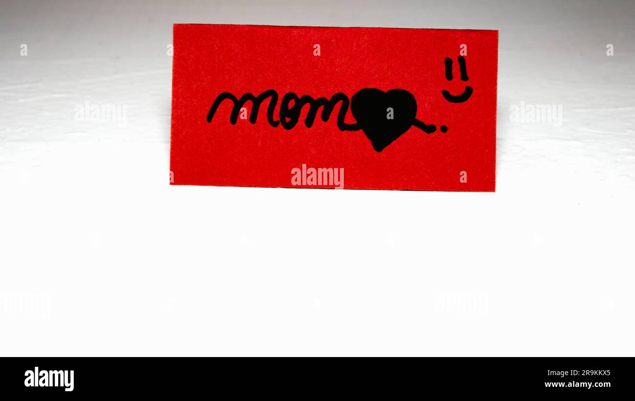 Mom writing love text for mother on paper. Label tag with lovely ...