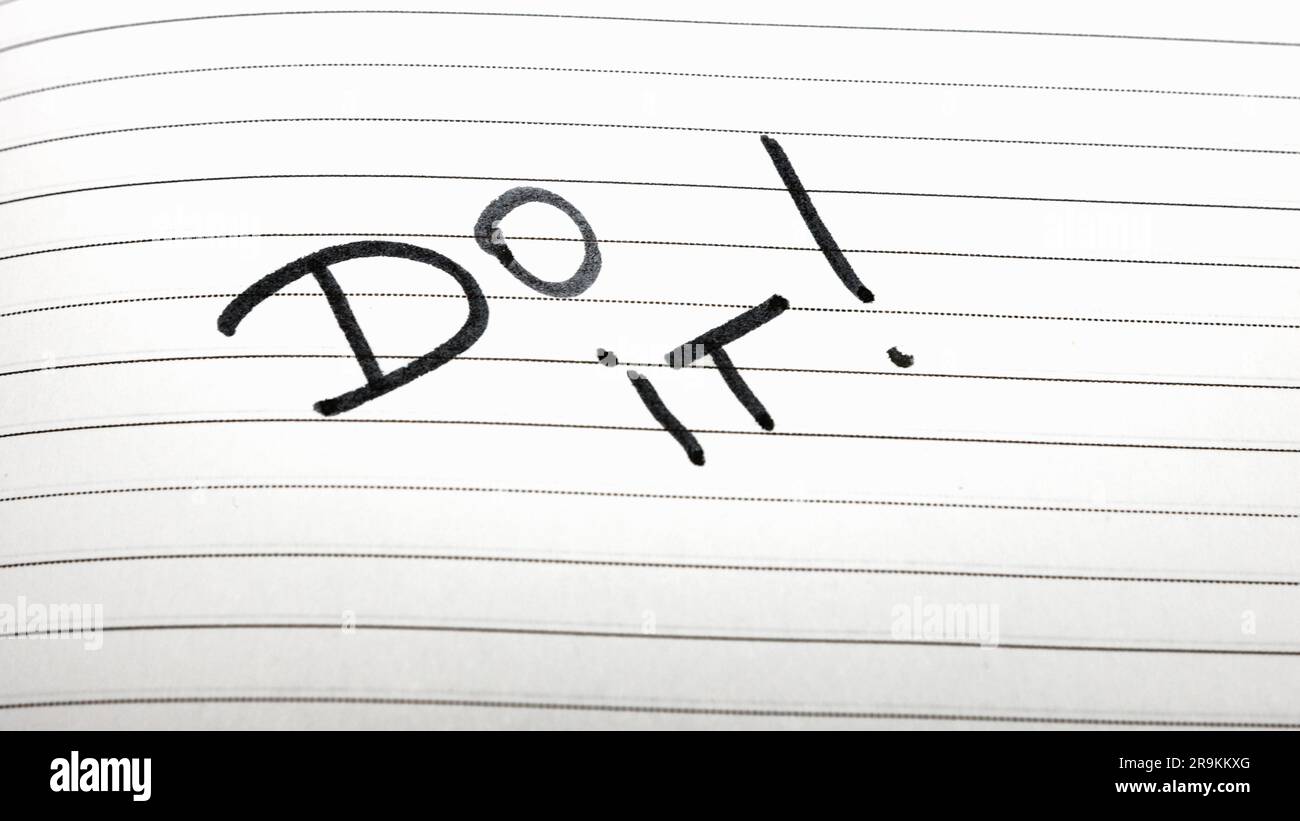 Do it, handwriting text on page of office agenda. Copy space Stock ...