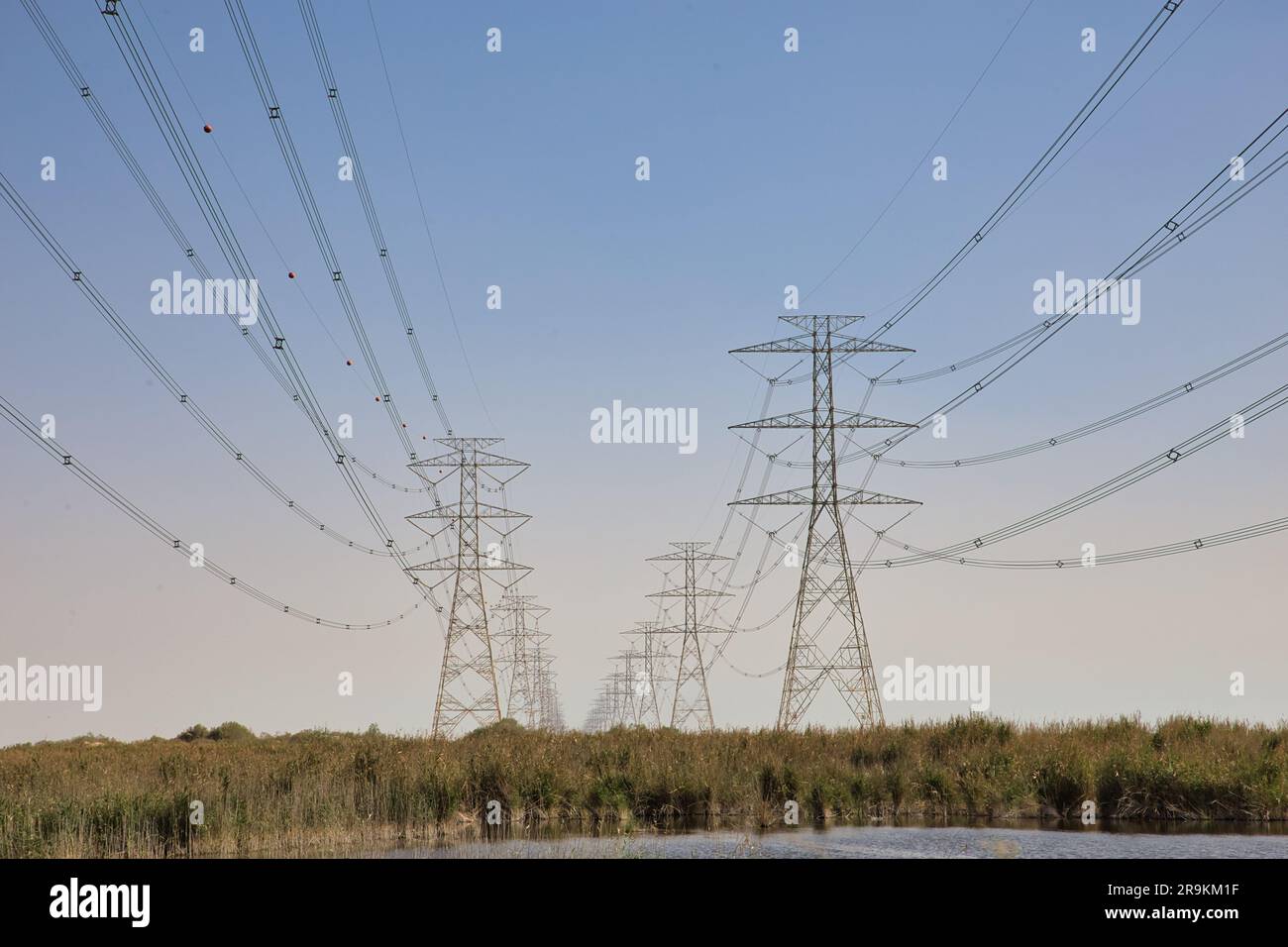 High Power Electric transmission grid lines in the desert.Dammam -Saudi ...