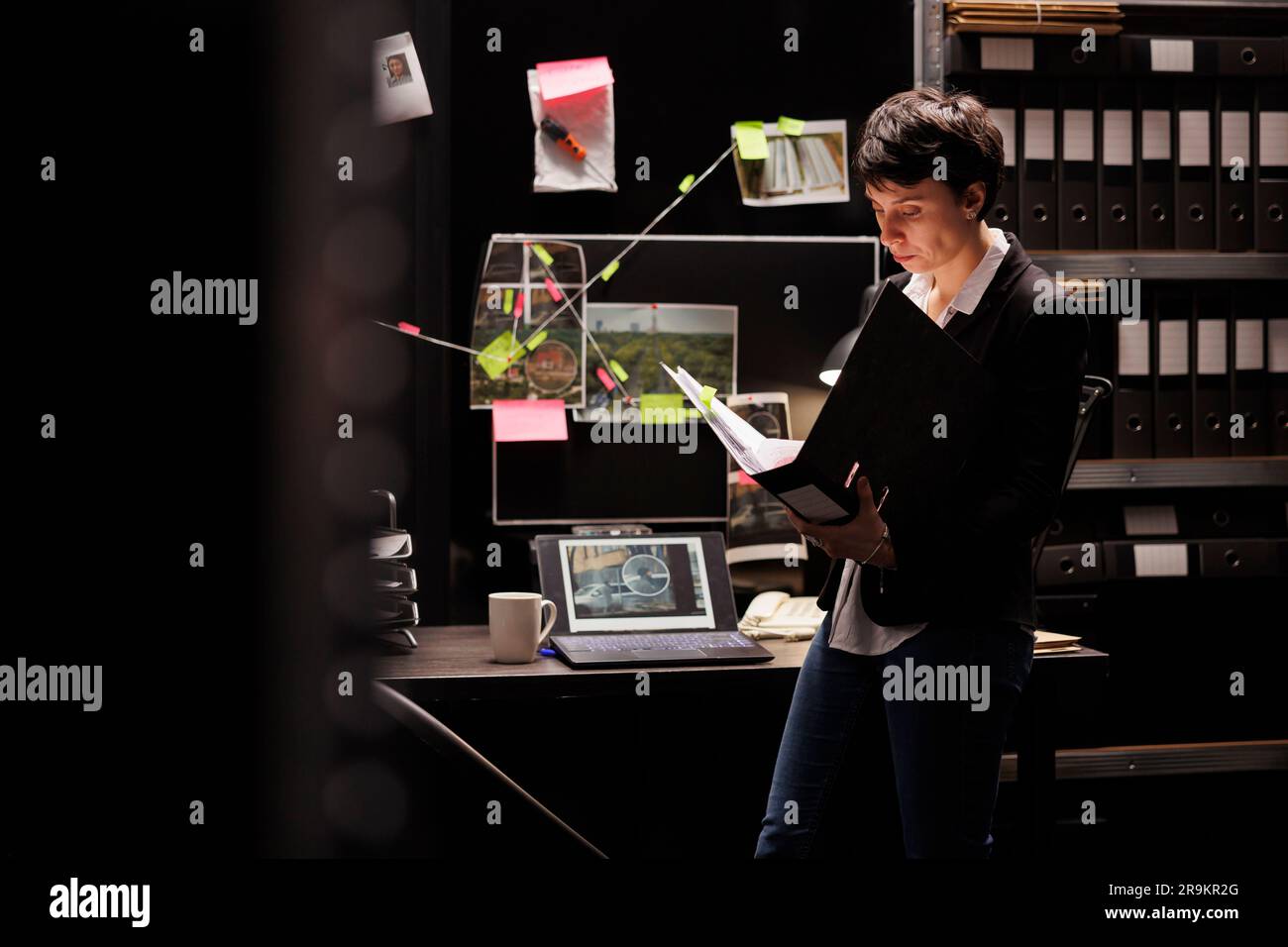 Federal agent investigating confidential case analyzing fraude report ...