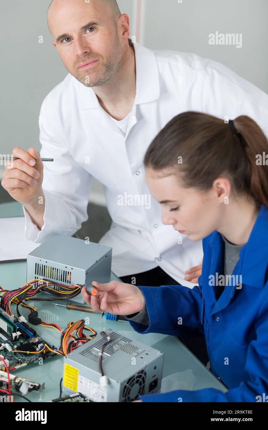 female student in a workshop of electrical engineering Stock Photo - Alamy