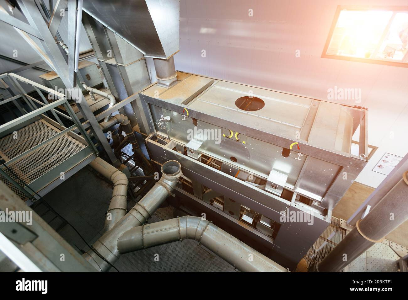 Industrial grain drying machine. Pipeline and separator Stock Photo - Alamy Industrial grain drying machine. Pipeline and separator Stock Photo - Alamy