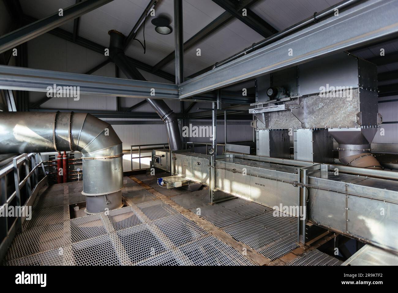 Industrial grain drying machine. Pipeline and separator Stock Photo - Alamy