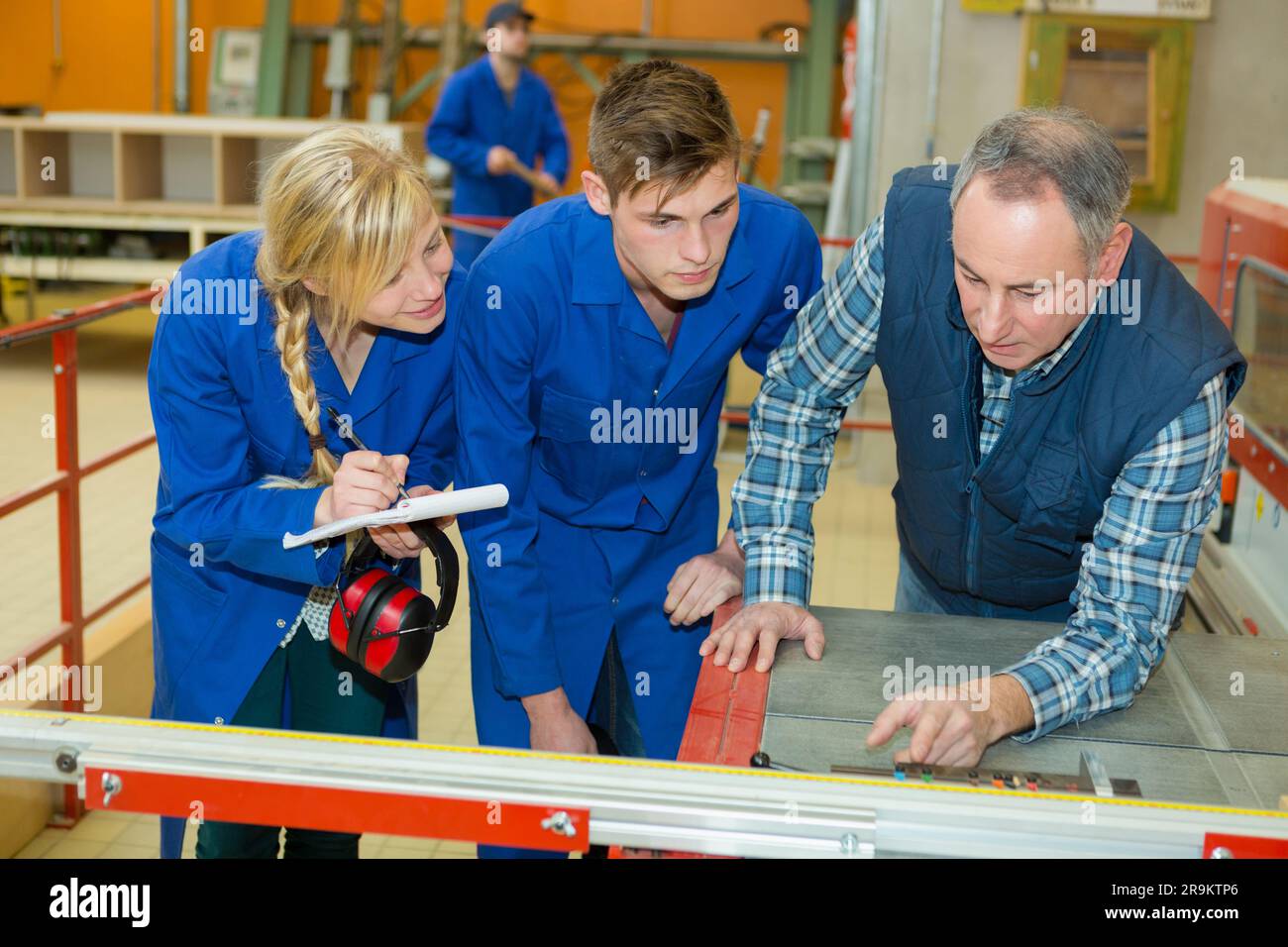 young apprentices in metalworkshop Stock Photo - Alamy