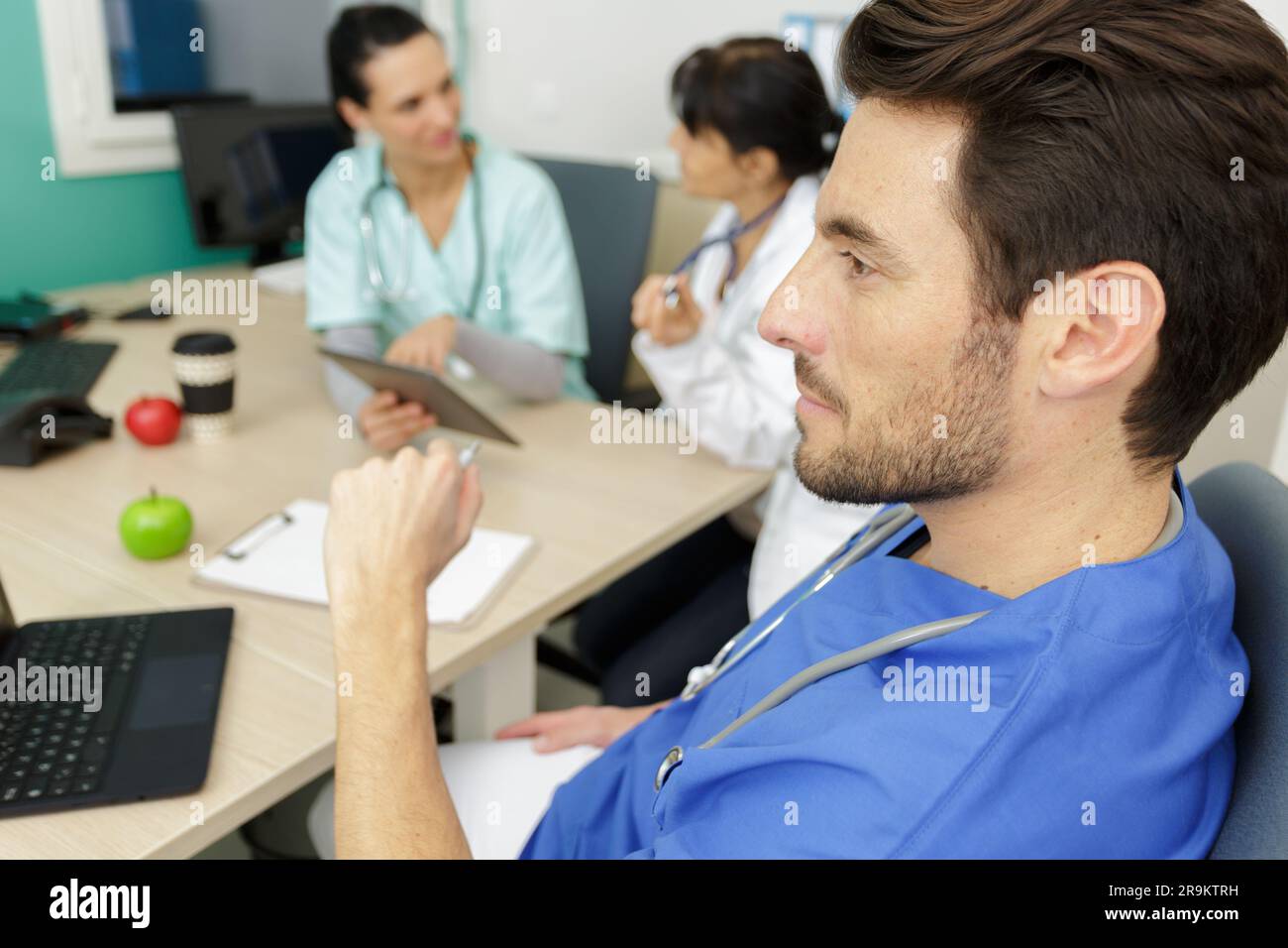 group of medical workers working together in hospital Stock Photo - Alamy