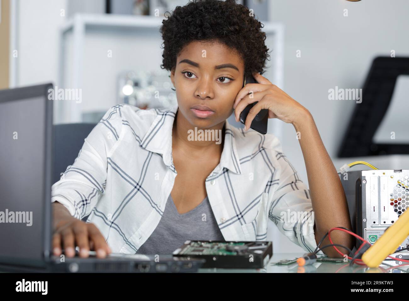 Checking electronics circuit board hi-res stock photography and images ...