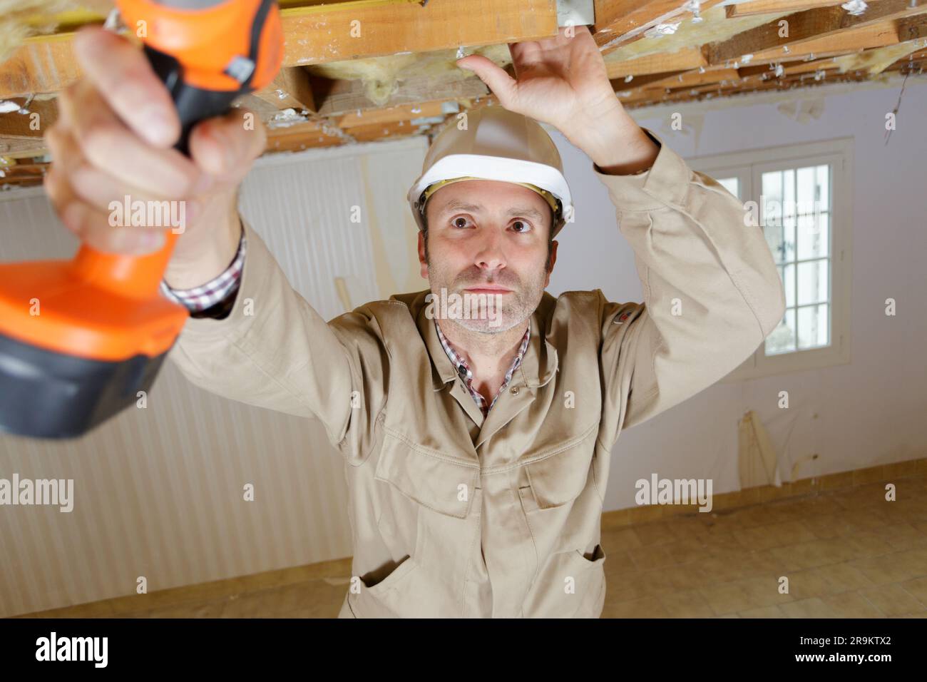 Drilling ceiling hi-res stock photography and images - Alamy