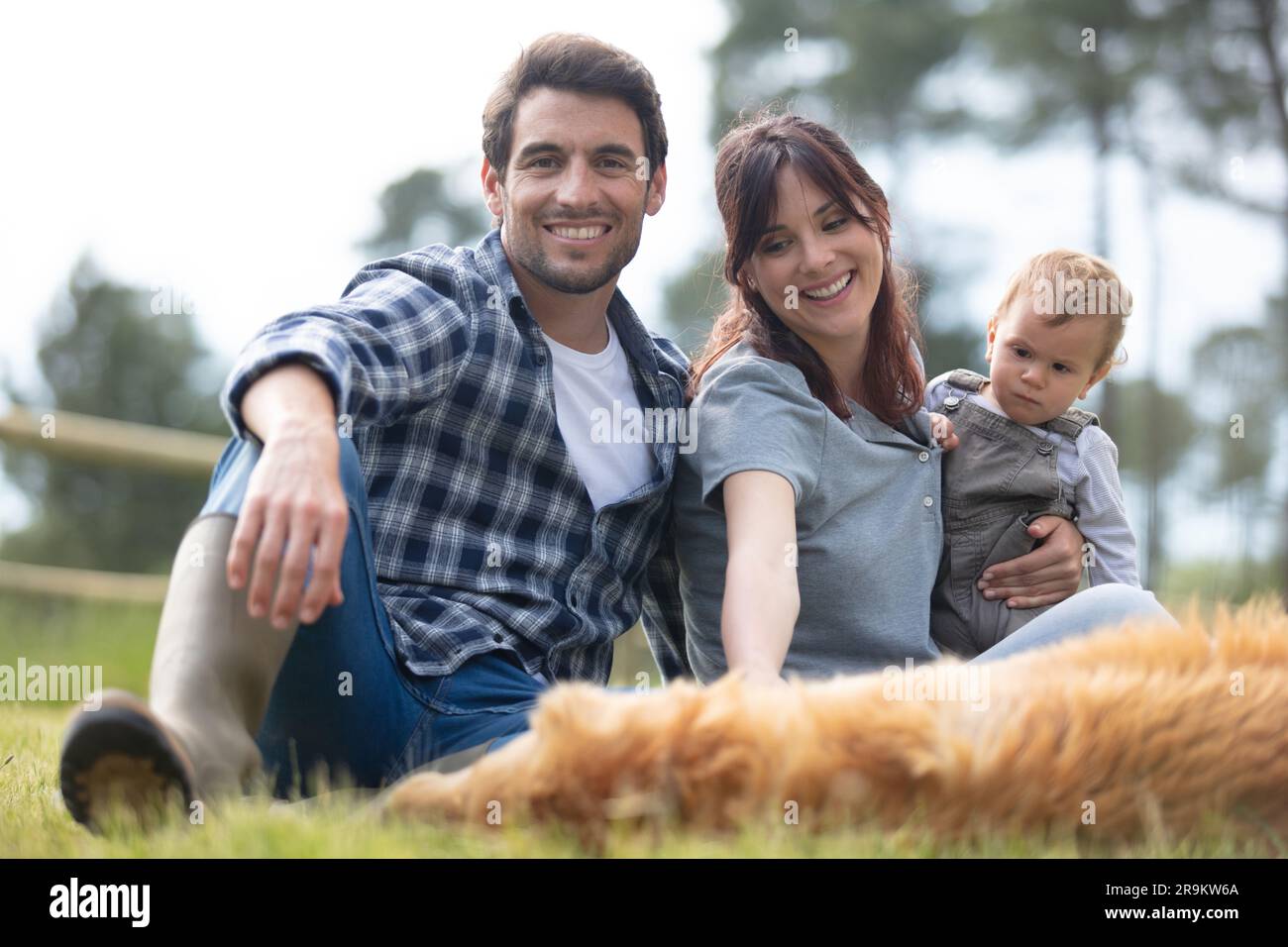 Happy young family harvesting hi-res stock photography and images - Alamy