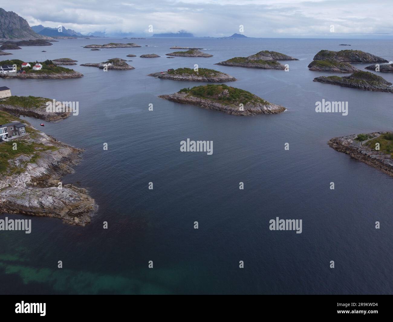An aerial view of a cluster of small islands off the coast of Norway ...