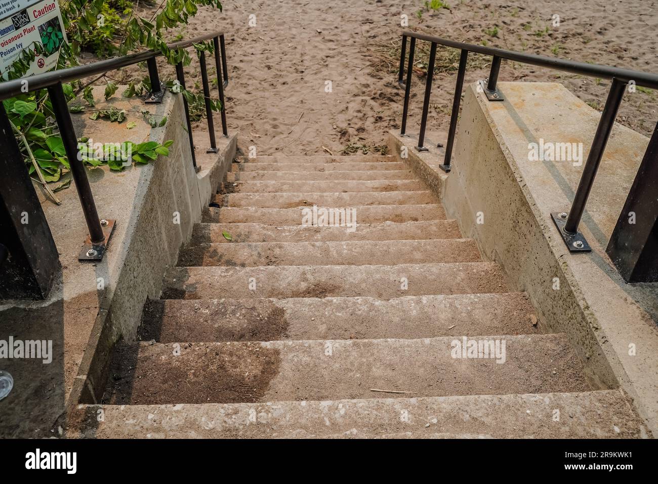stairs leading down to a sandy beach Stock Photo - Alamy