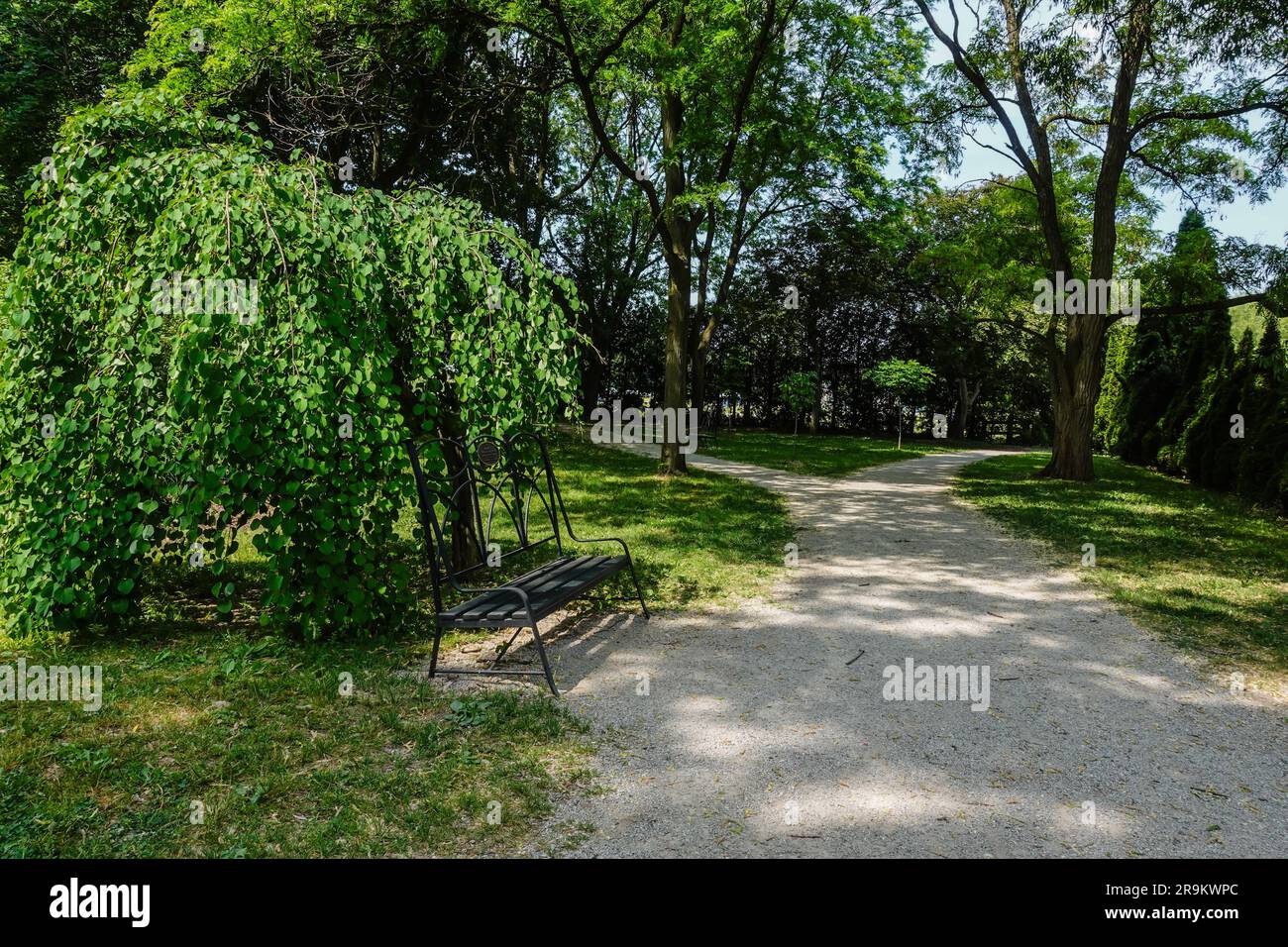 gravel pathway inside a park summer time Stock Photo - Alamy