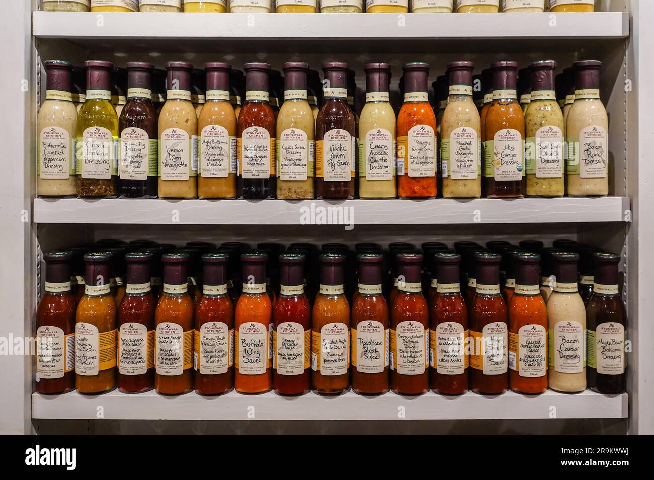 A display shelf of dressing, sauce in bottles Stock Photo - Alamy