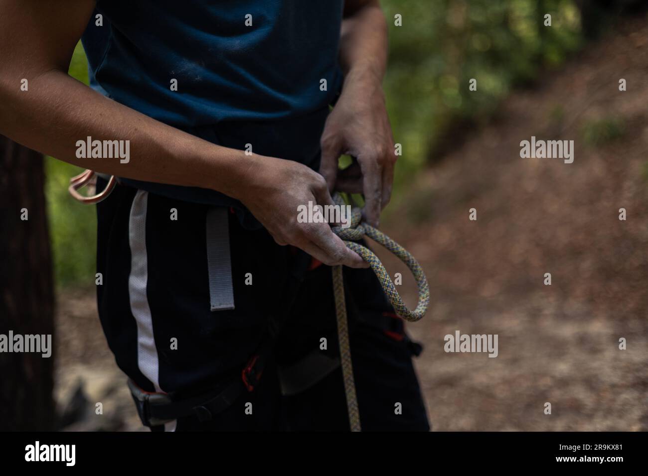 Tied to large rock hi-res stock photography and images - Alamy