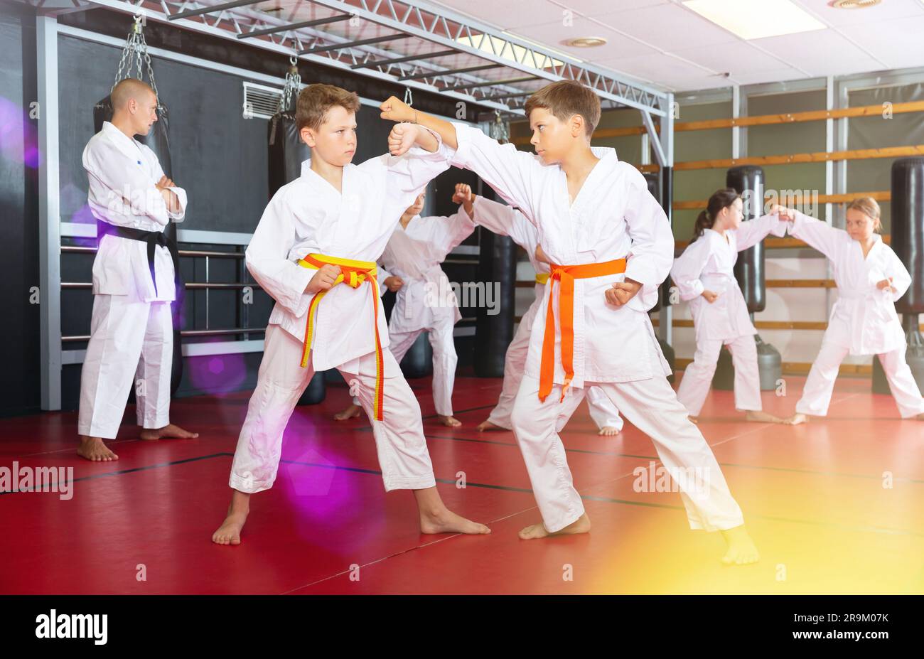 Boys and girls in kimono sparring together Stock Photo - Alamy