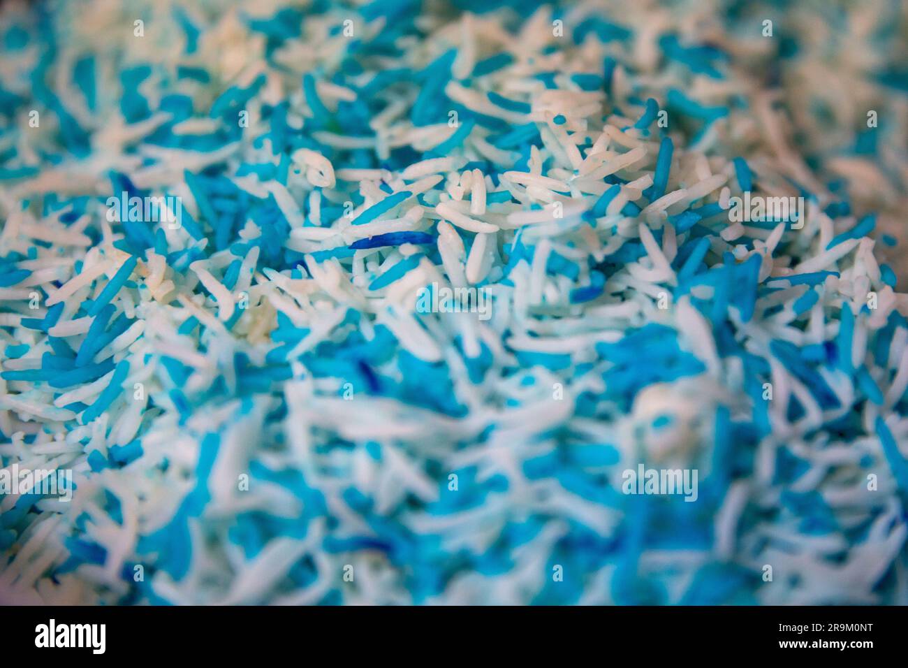 Coloring rice blue hi-res stock photography and images - Alamy