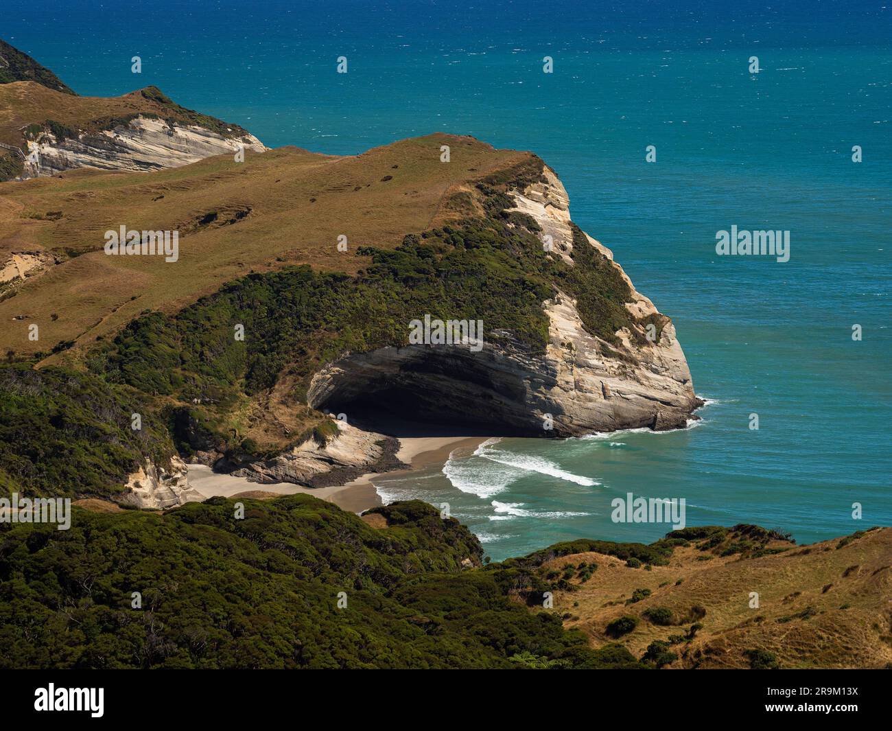 Oceanside cliff natural bridge arch rock formation, coastal nature ...