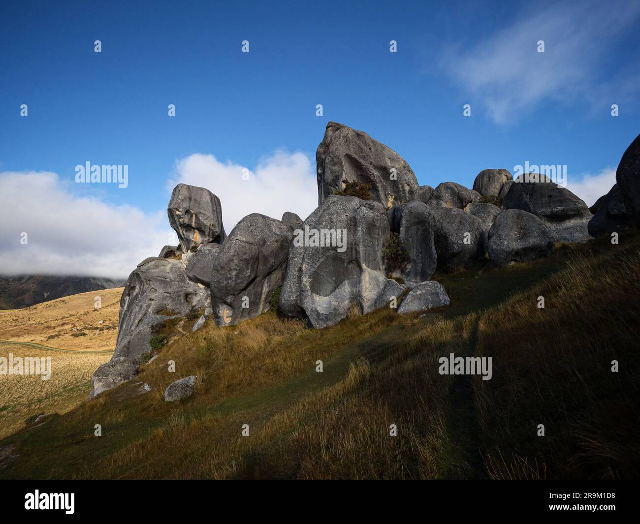 Nature landscape panorama view of large limestone boulder rocks in dry ...