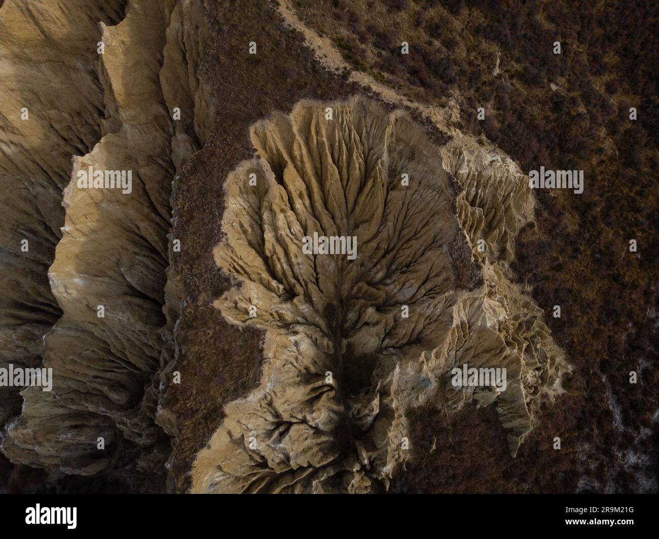 Aerial top down view of Omarama Clay Cliffs geological natural erosion ...