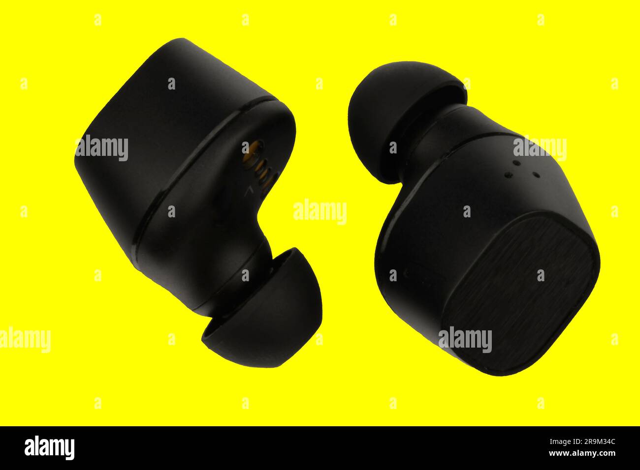 Wireless stereo earbuds. Black wireless earphones. Earbuds or ...
