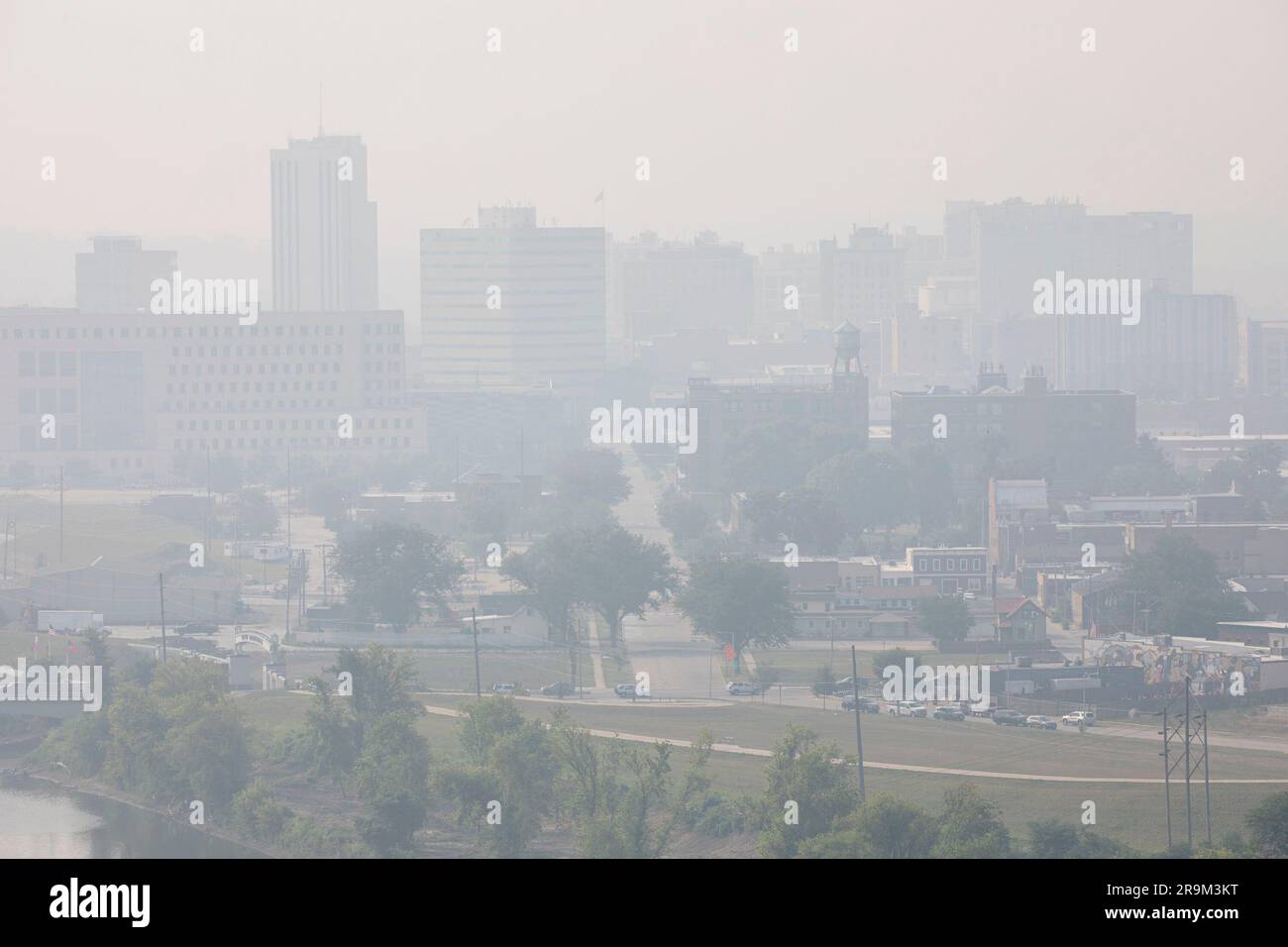 Haze obscures the skyline in Cedar Rapids, Iowa, on Tuesday, June 27 ...