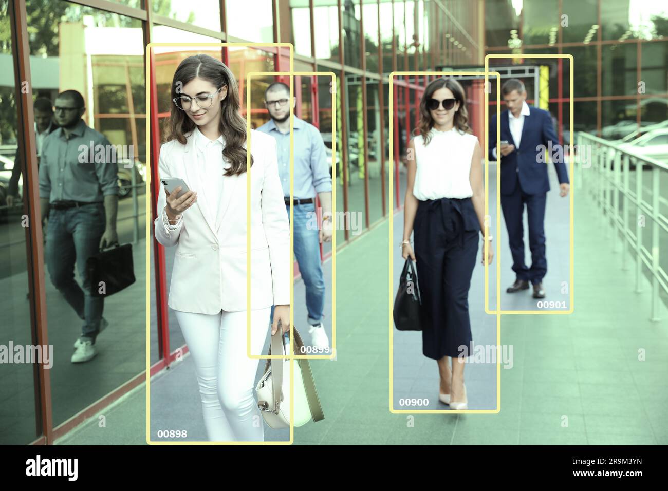 Facial recognition system identifying people on city street Stock Photo ...