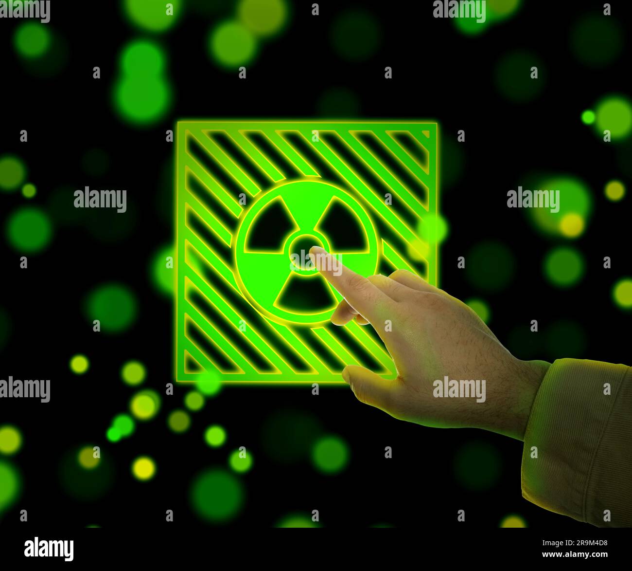 Man touching glowing radiation warning symbol on black background with ...