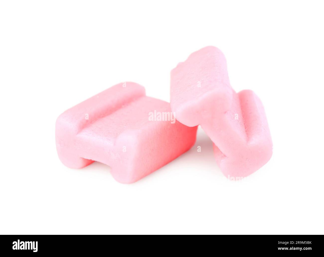 Tasty pink chewing gums isolated on white Stock Photo - Alamy